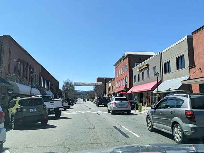 Main Street Franklin on a sunny day, where the mountains peek over the rooftops like curious neighbors.