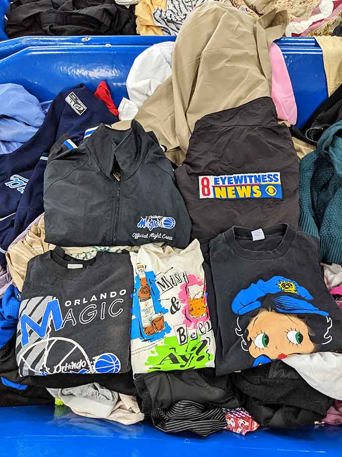 An Orlando Magic Flight Crew jacket and a Betty Boop tee walk into a bin together, and honestly, both deserve a second chance.