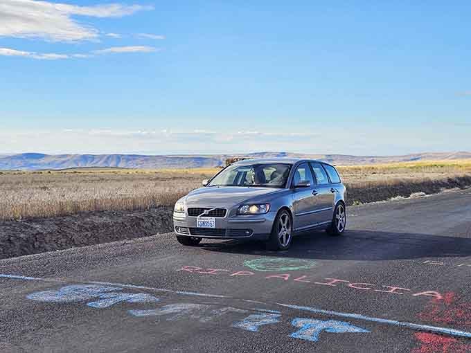A car sits at the starting line of the greatest free magic trick in Washington State.