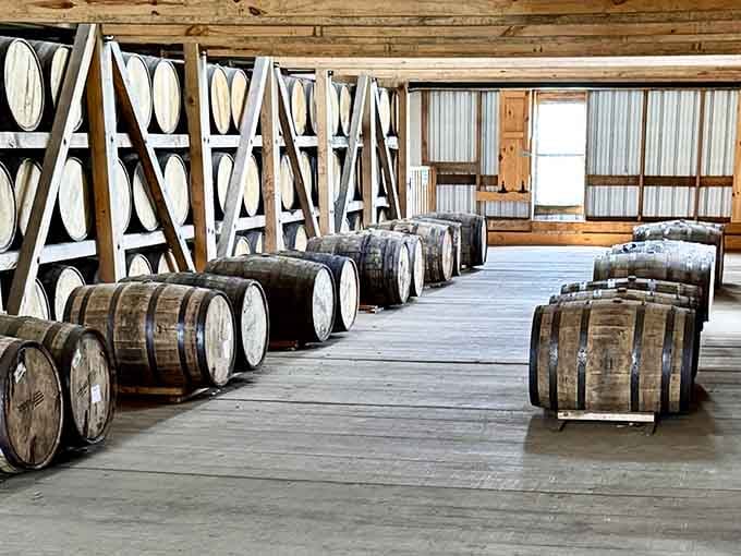 Rows of aging barrels in a Heaven Hill rick house. Patience has never smelled this good.