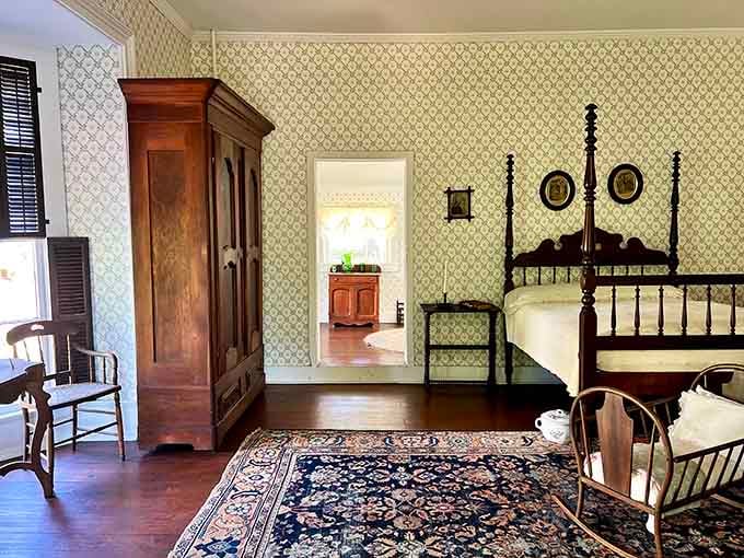 The four-poster bed and tall wooden armoire stand quietly, holding the weight of an extraordinary family's story.