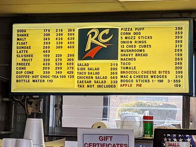A glowing yellow menu board packed with honest choices, this is decision-making the way it was meant to be done.