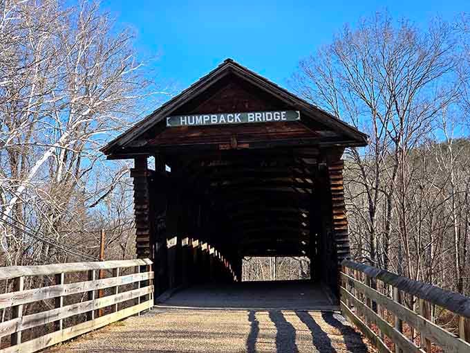 That bold "Humpback Bridge" sign above the dark timber entrance is basically Virginia saying, "Yes, we've been holding out on you."