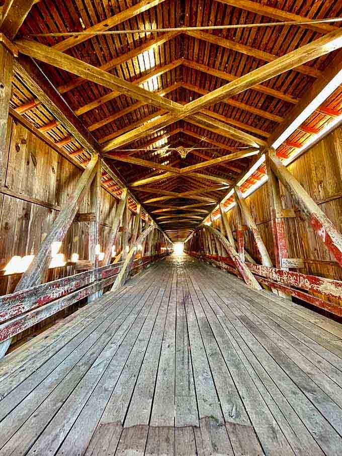 Those crisscrossing overhead beams are basically 19th-century engineering showing off, and honestly, good for them.