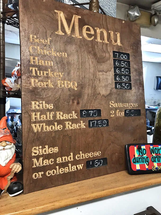 A wooden menu board with five proteins and two sides. Refreshingly simple, surprisingly perfect.