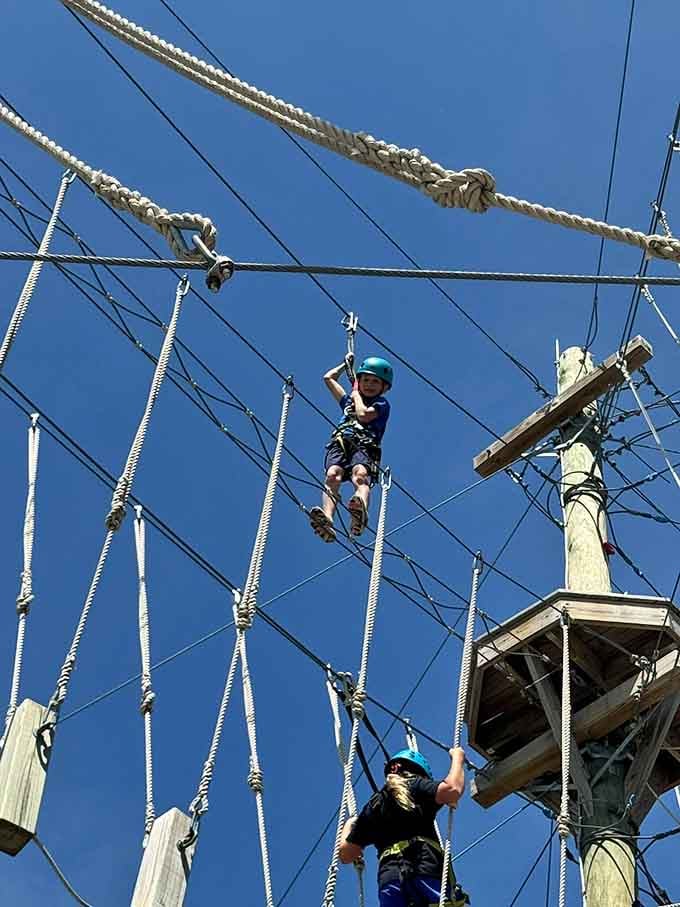 That grin says it all. Heights are just a matter of perspective, kid.