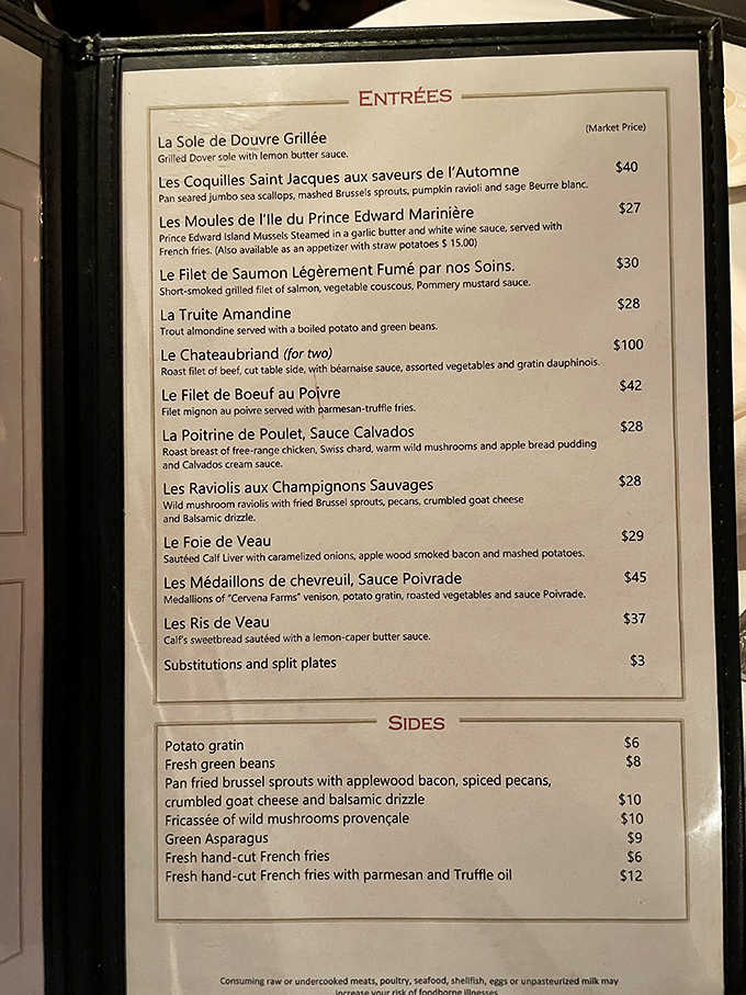 A menu written in French with English translations underneath. Fancy enough to impress, practical enough to actually order from.
