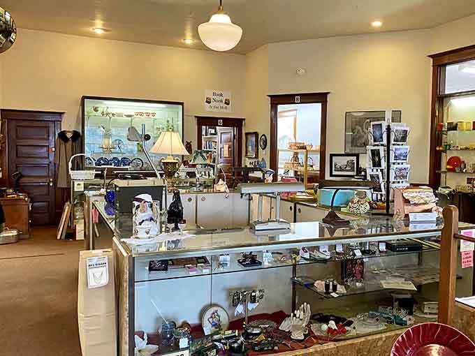 Glass cases full of glittering curiosities, a brass lamp, and a Book Nook corner calling your name.