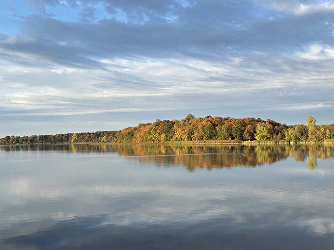 When the lake mirrors the autumn sky this perfectly, you start wondering if nature is showing off on purpose.