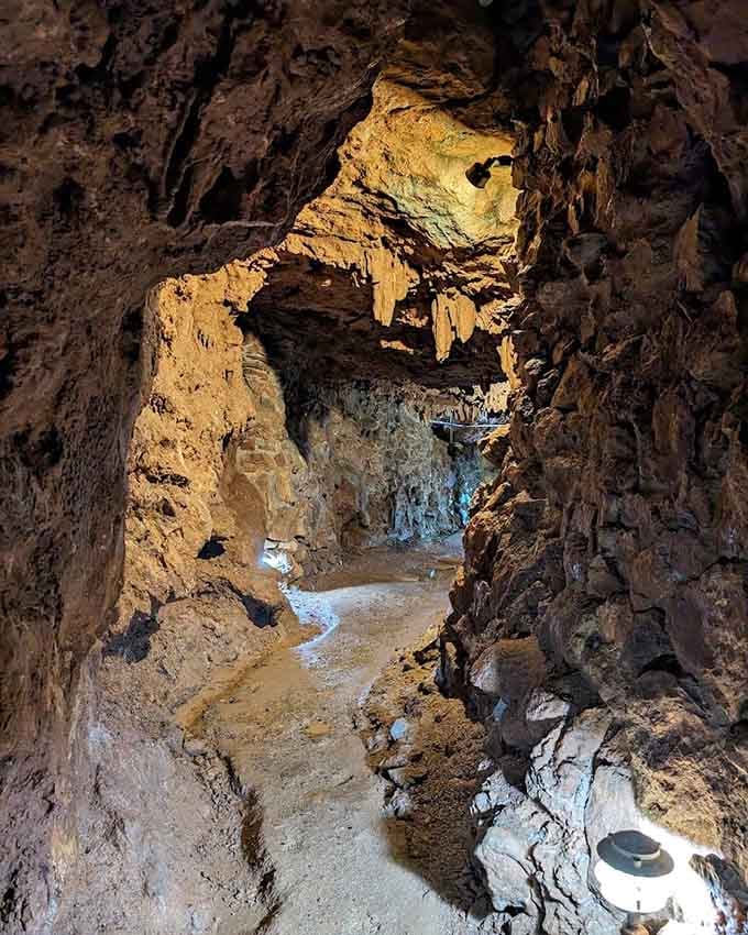 Stalactites hanging overhead like nature's own chandelier collection, each one taking centuries to craft.
