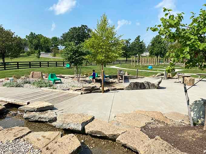 Natural stone waterways transform geology into playground magic, because who needs screens when you've got this?