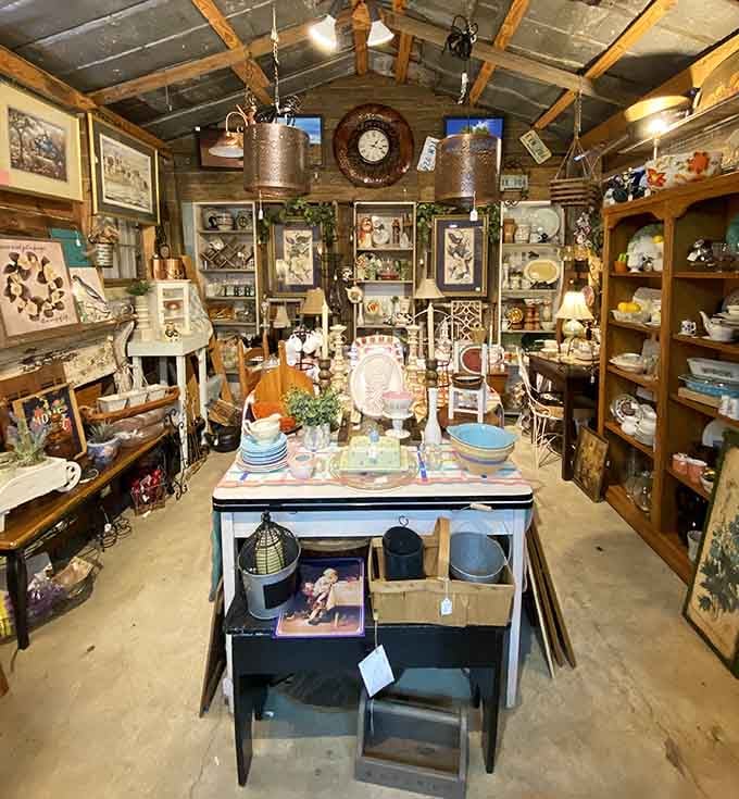 Every shelf tells a story in this rustic outbuilding, packed with charming vintage treasures from floor to ceiling.