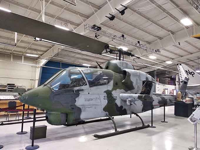 The Bell AH-1 Cobra looks mean in camouflage, proof that some machines were born with attitude.