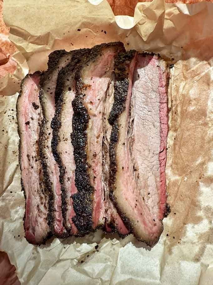That smoke ring and bark tell you everything you need to know about why people wait in line for this brisket.