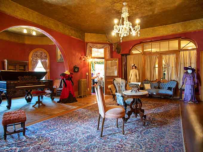 Deep red walls, a crystal chandelier, and period gowns that make you feel underdressed just standing there.