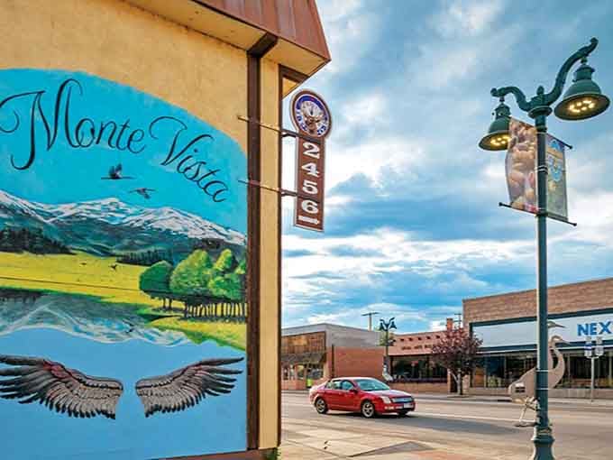 A mural with snow-capped peaks and outstretched wings tells you everything about Monte Vista's soul before you've even walked a single block.