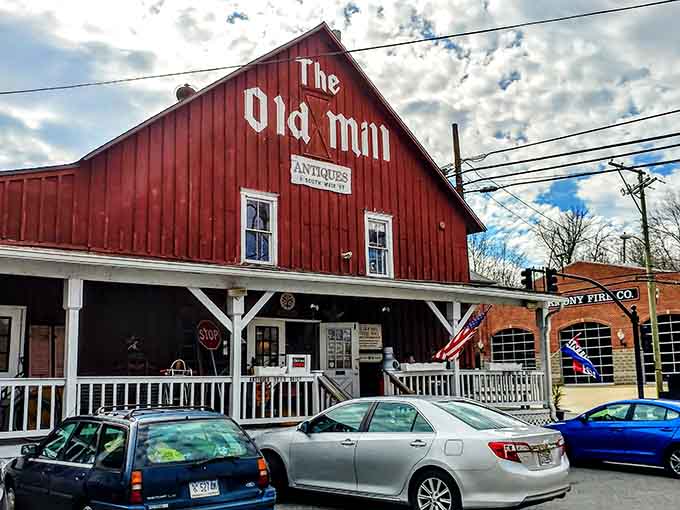 The Old Mill Antique Mall is the kind of red barn that makes you pull over, walk in, and lose track of time completely.