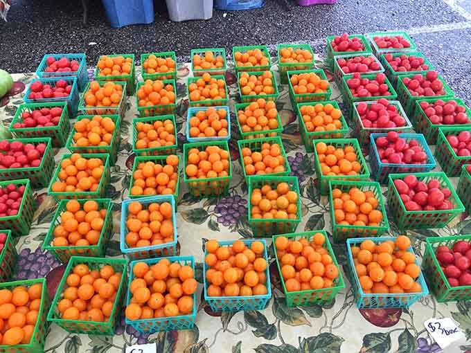 These cherry tomatoes look like nature's candy store exploded in the best possible way across this vendor's table.