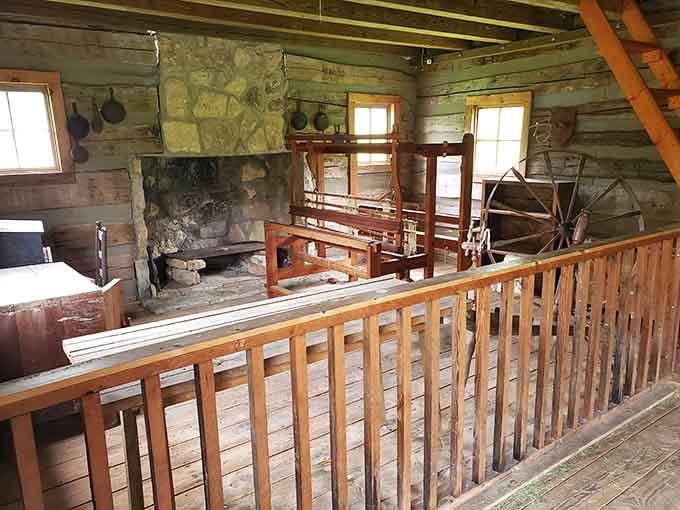 A loom, a spinning wheel, and a stone fireplace. Life was busy long before smartphones existed.