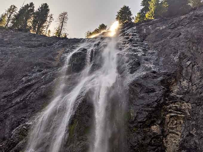 Sunlight crowns the top of Peewee Falls like nature turned on a spotlight just for the occasion.