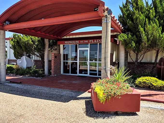 The Museum of the Plains welcomes you under its terracotta canopy, where the deep story of the High Plains waits just inside those glass doors.