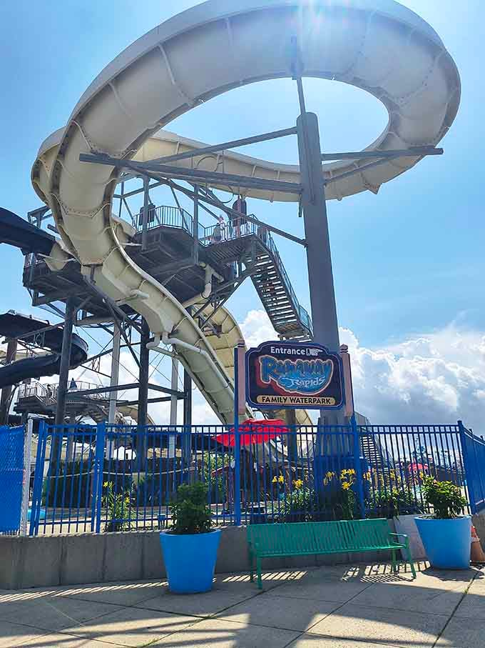That large swooping slide at the entrance is basically the park's handshake, firm, confident, and slightly thrilling.