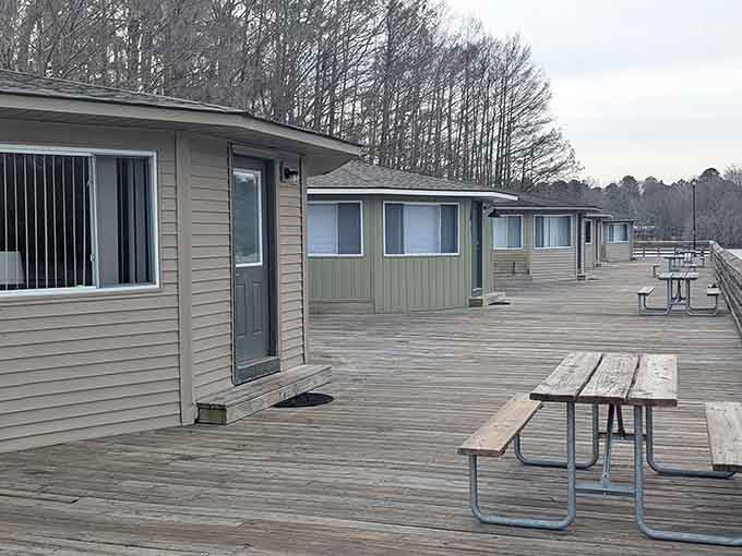 Your morning coffee spot comes with a built-in fishing pier, because multitasking should always involve water and relaxation.
