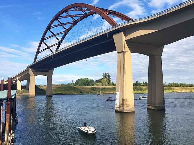 That red arch bridge is your official invitation to leave the city noise behind, and you should accept it.