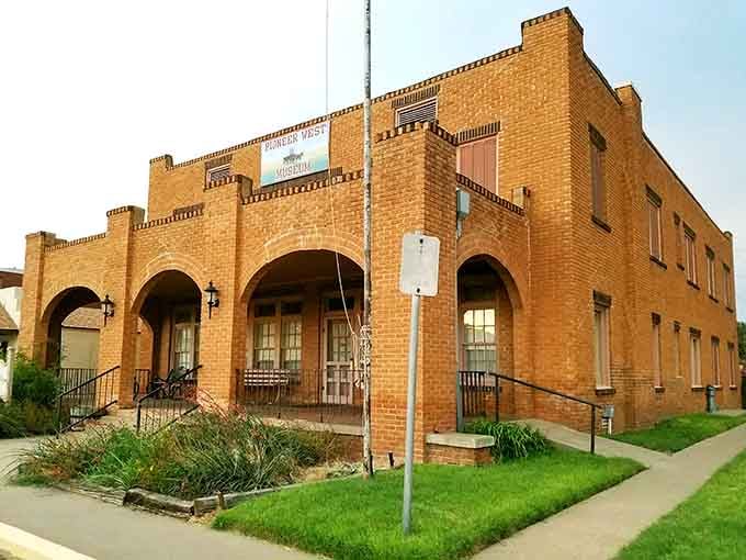 The Pioneer West Museum's warm brick arches look like they've been patiently holding Panhandle history together for generations.