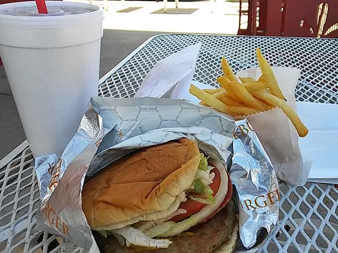Wrapped in foil, loaded with fresh toppings, and sitting next to crinkle-cut fries. This is happiness on a table.