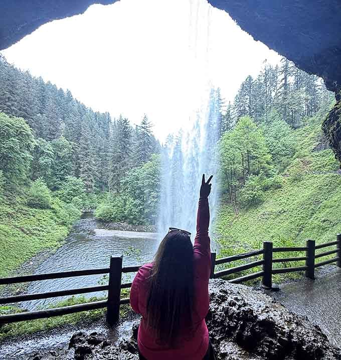 Standing behind a waterfall and throwing up a peace sign is the most Oregon thing you can do.