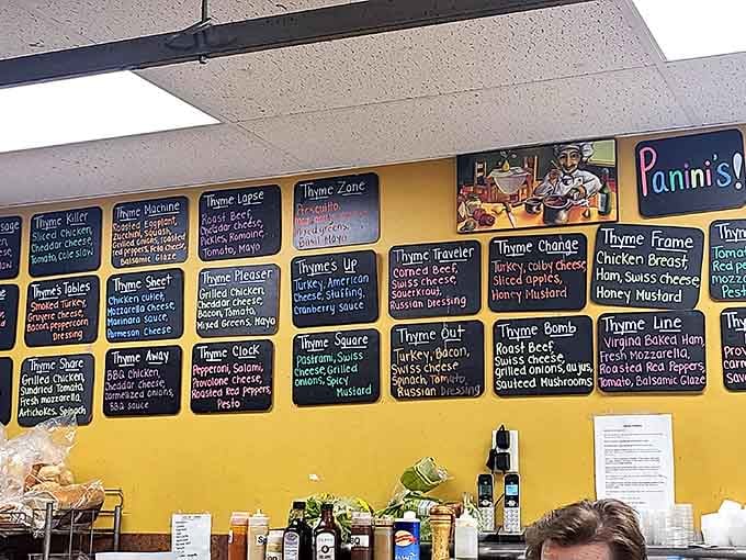 A wall full of pun-named paninis, and every single one sounds better than the last. The "Thyme Zone" alone deserves its own fan club.