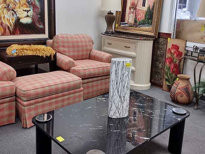 That pink gingham chair with matching ottoman is giving serious cottage core vibes at thrift store prices.