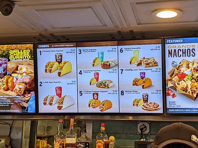 The full Taco Bell Cantina menu, where classics like the Crunchwrap Supreme and Mexican Pizza share space with the bar behind them.