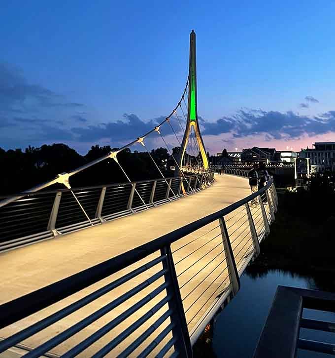 When twilight transforms the walkway into a glowing ribbon, you'll understand why cameras come out constantly.