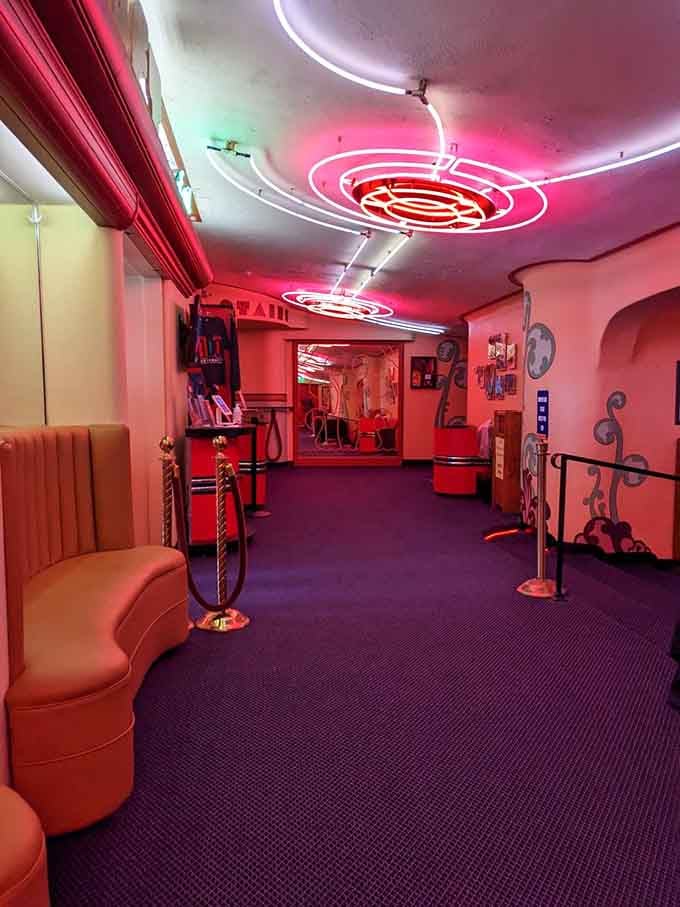 This neon-lit lobby corridor proves that some hallways are genuinely worth slowing down for.