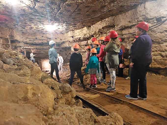 Hard hats on, curiosity cranked up — these visitors are learning what 50 feet below Wisconsin actually feels like.