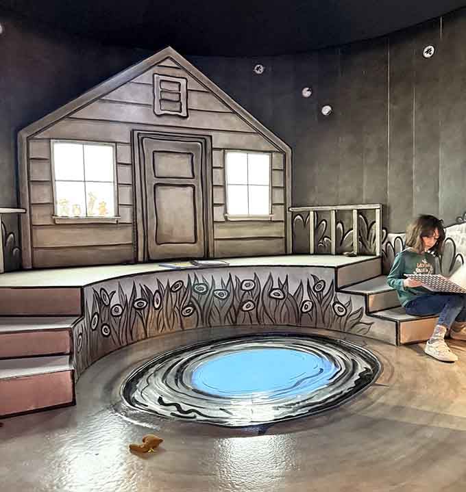 That swirling vortex on the floor isn't a drain — it's a portal, and somehow that feels completely reasonable here.