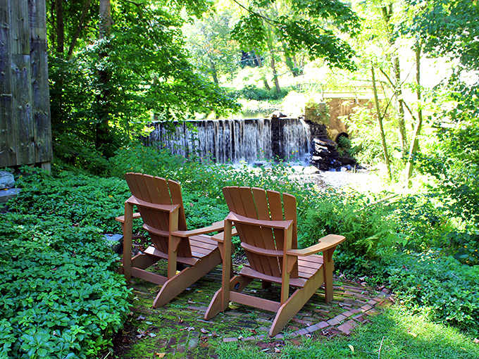 Two chairs, one waterfall, zero excuses to check your email. This is what living looks like.