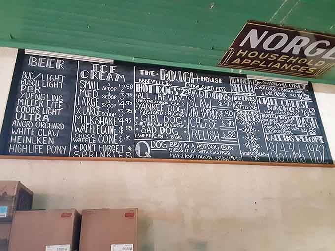 Hand-chalked menus are the original artisanal touch, no fancy fonts required for this masterpiece.