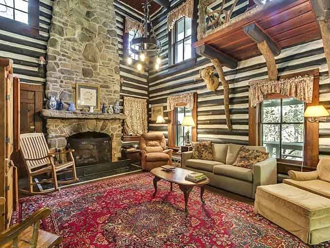 A stone fireplace this grand doesn't just heat a room. It holds court over everything around it.