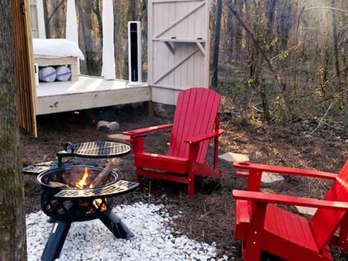 Two red Adirondack chairs, a fire pit, and zero obligations. This is what retirement should look like.