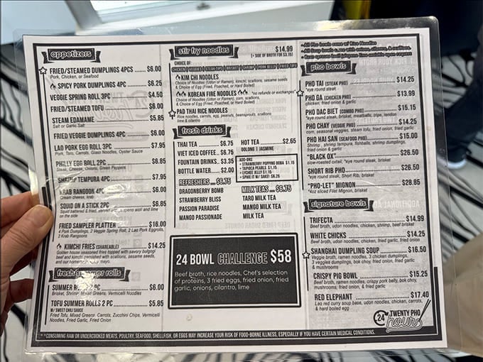 The menu reads like a greatest hits album of Vietnamese cuisine, all served in illustrated surroundings.