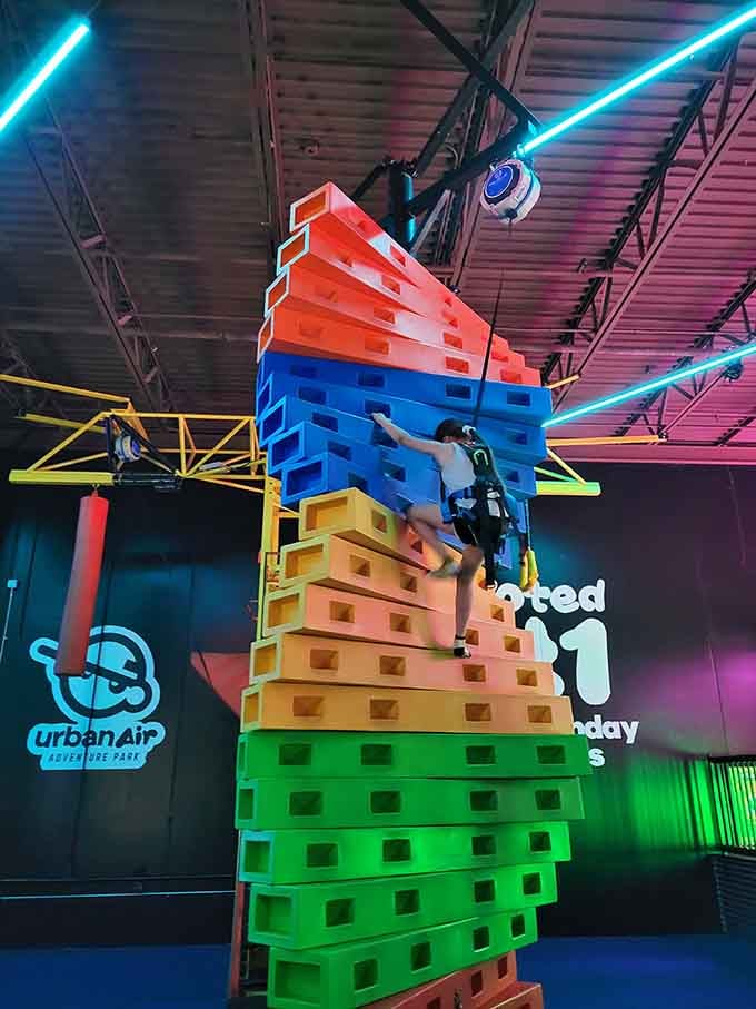 One colorful block at a time, this climbing wall turns ordinary visitors into determined little mountaineers.