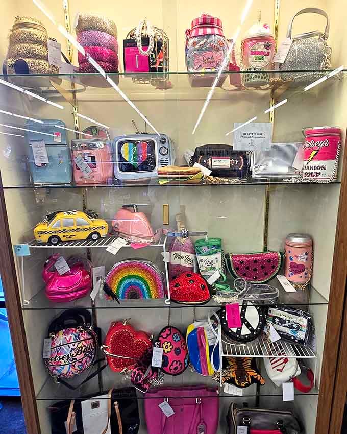 Sparkly purses and novelty bags line up like a rainbow of personality, each one begging for adoption.