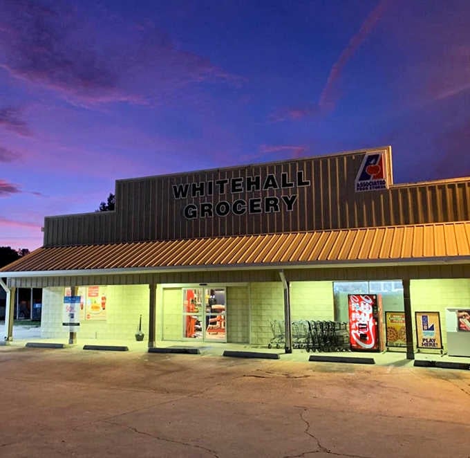 Whitehall Grocery glows like a beacon at dusk, quietly proving that good value never needs a flashy entrance.