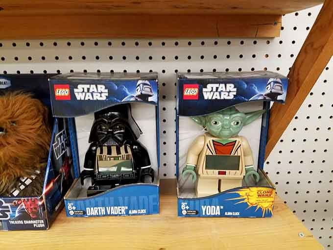 Darth Vader and Yoda, still in their boxes, patiently waiting for the right collector to take them home.