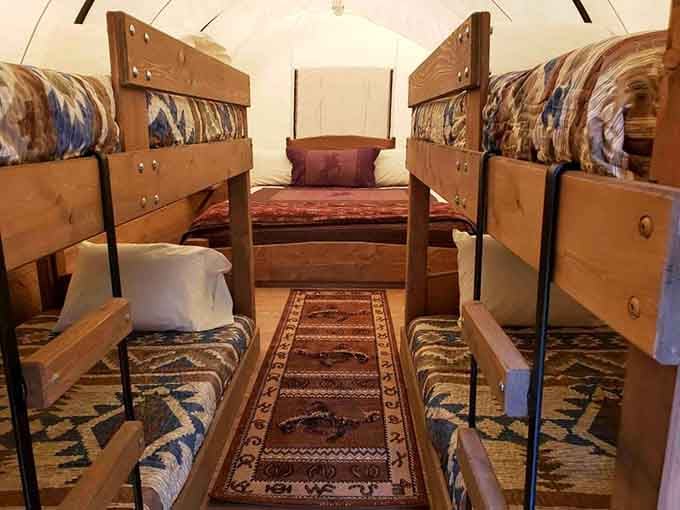 Bunk beds that would make any pioneer family jealous, complete with actual mattresses and pillows instead of hay.