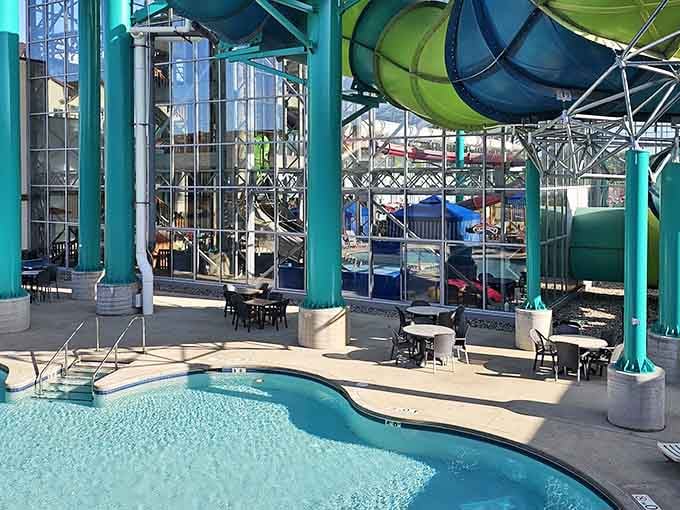 Sunlight pours through the glass walls here, turning poolside seating into the most relaxed front-row seat in Michigan.