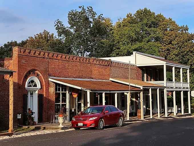 Arrow Rock's warm brick storefronts glow in the autumn light like something straight out of a Hallmark movie, except completely real.